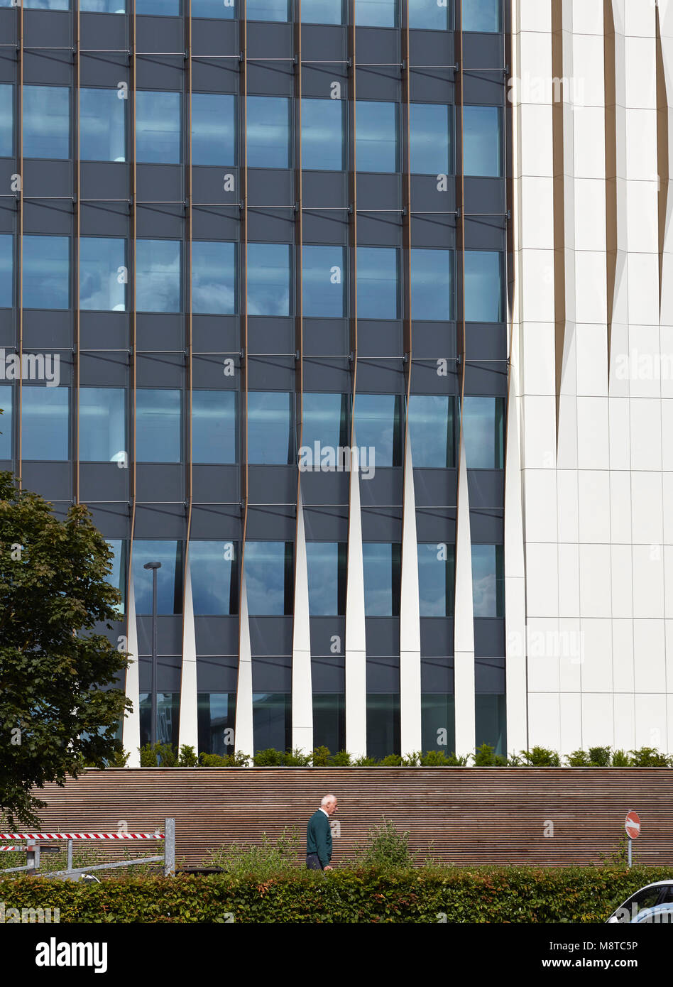 View of exterior facade from car park with passing figure. 1 Forbury ...