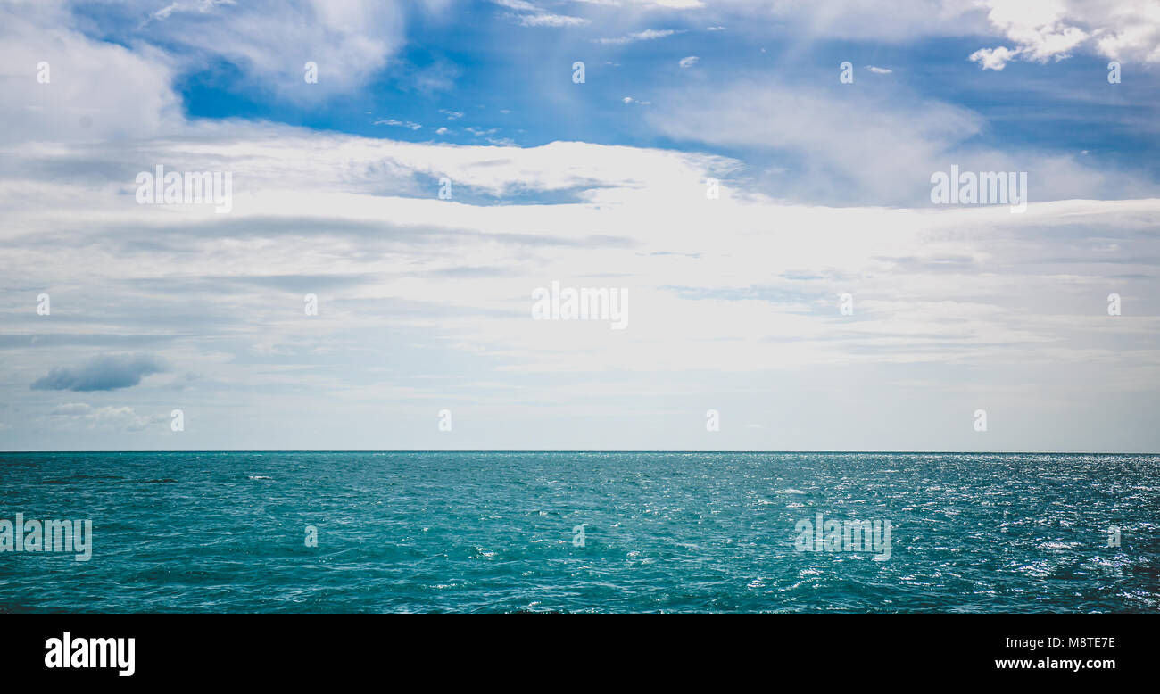 Sea Tropical Sunset with dark mood ocean tone Stock Photo - Alamy