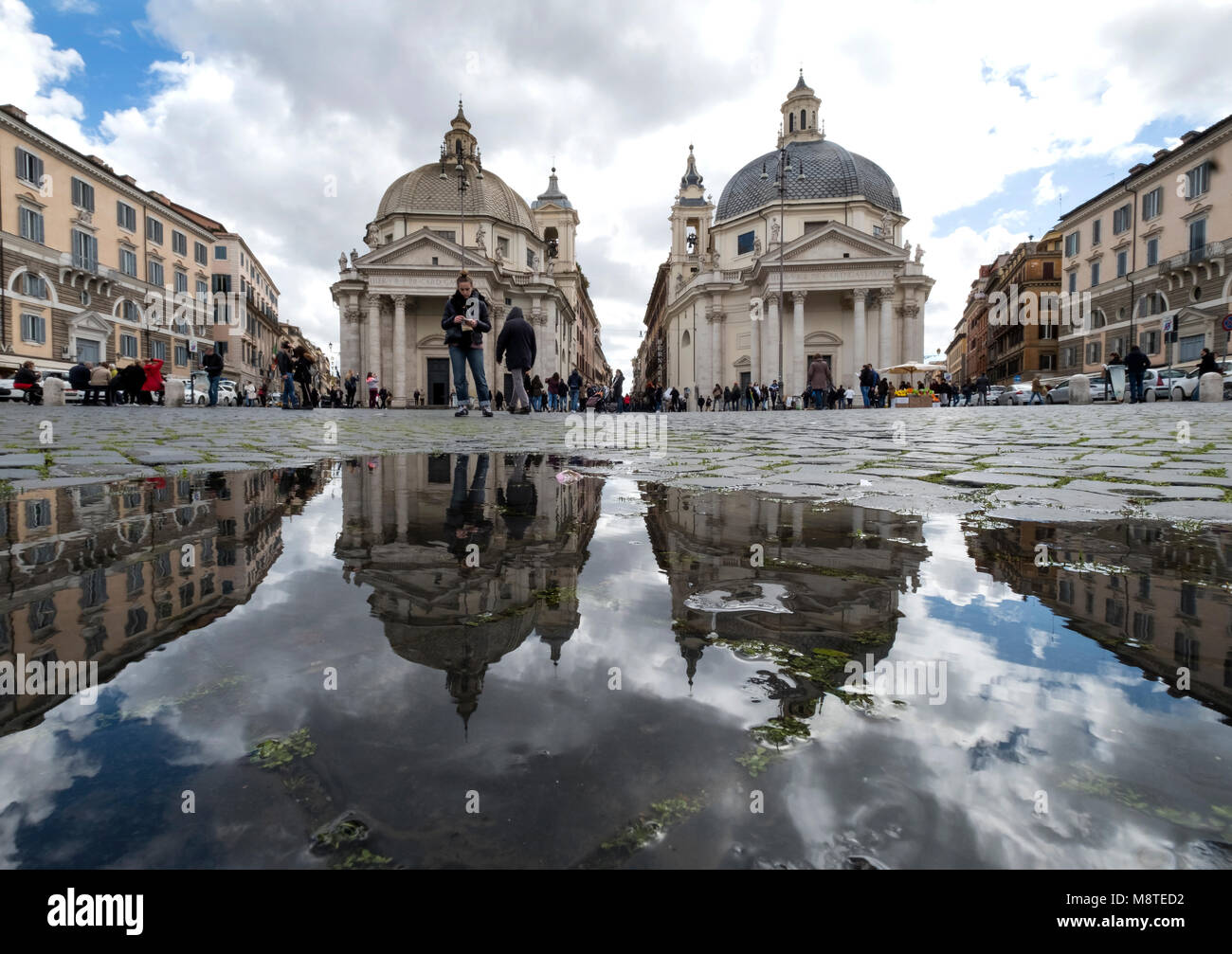 Reflections in the Piazza del Popolo after rain. Its defined by the ...