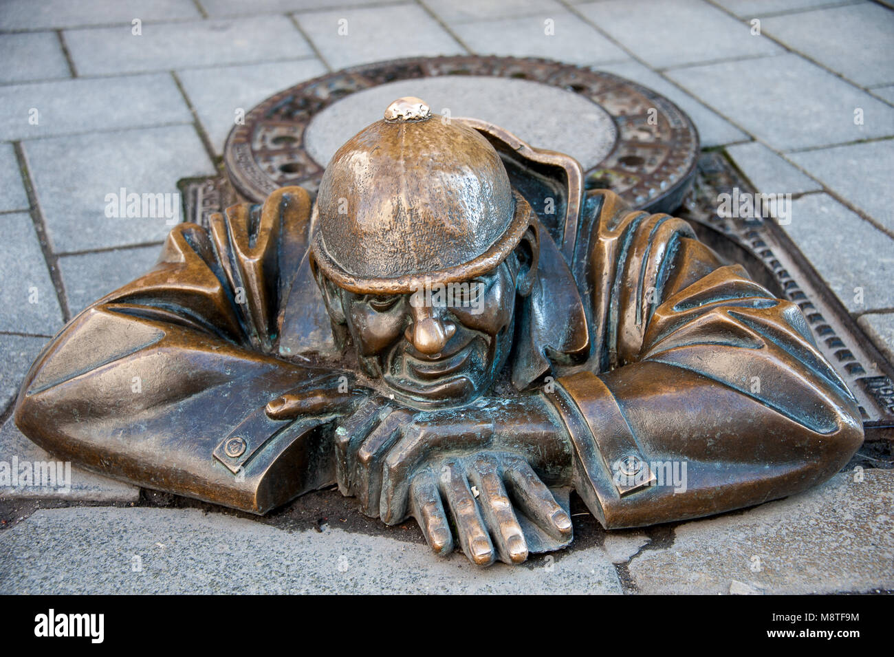 Bratislava, Slovakia: Bronze sculpture of 'Cumil, The Watcher', old ...
