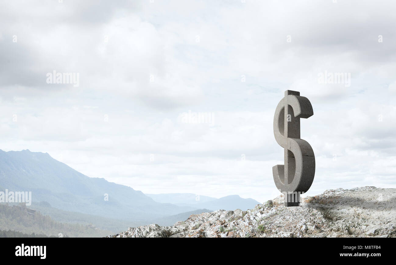 Stone dollar symbol outdoors on green hill as currency sign Stock Photo ...