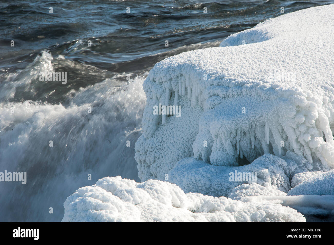 Winter wonderland, Selfoss, Iceland. Turquoise waters contrast with ...