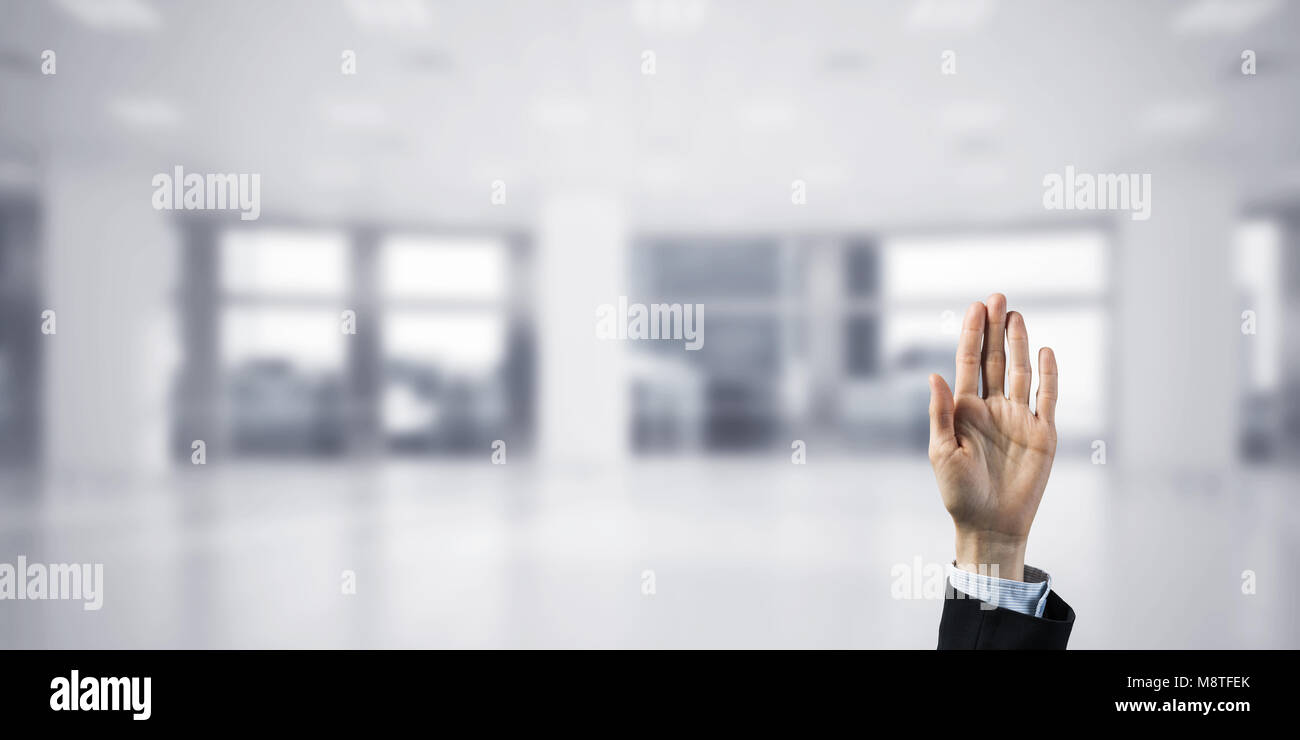 Close of businesswoman hand touching screen with palm and office at ...