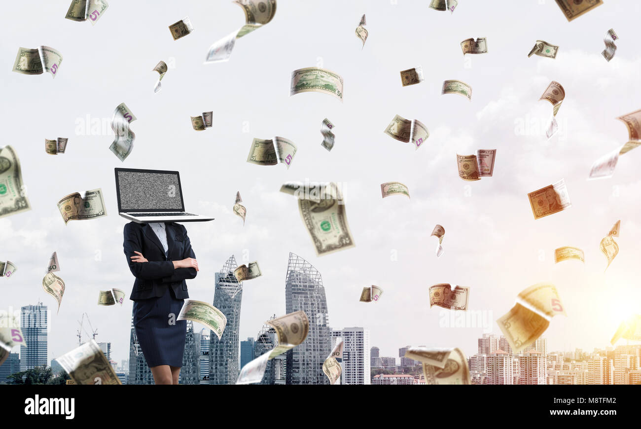Cropped image of business woman in suit with laptop instead of head ...