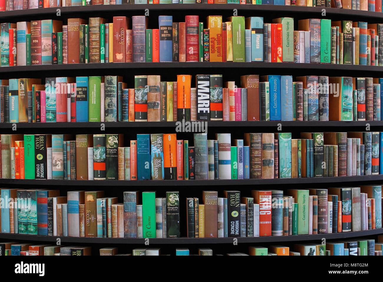 Book shelves in library different languages Rome Italy circa June 2012 ...