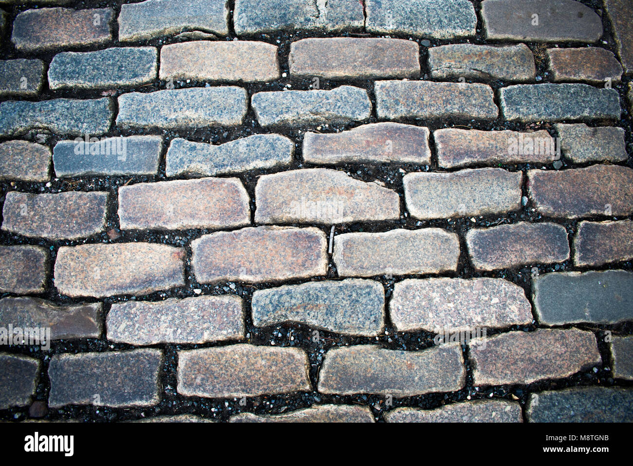 A cobblestone, brickwork textrued background Stock Photo - Alamy