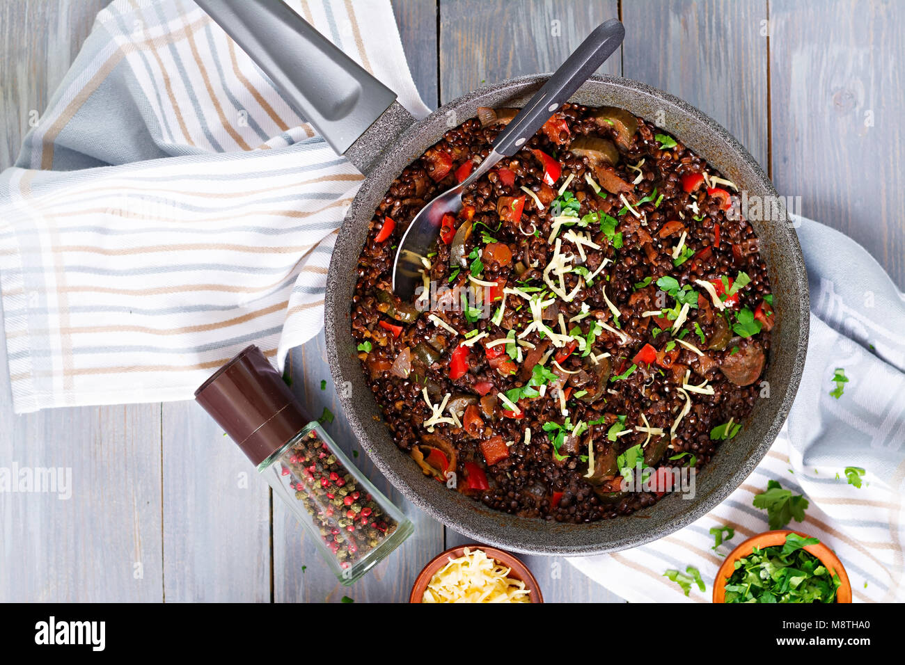 Black lentil beluga with vegetables. Lenten menu. Vegan food. Top view ...