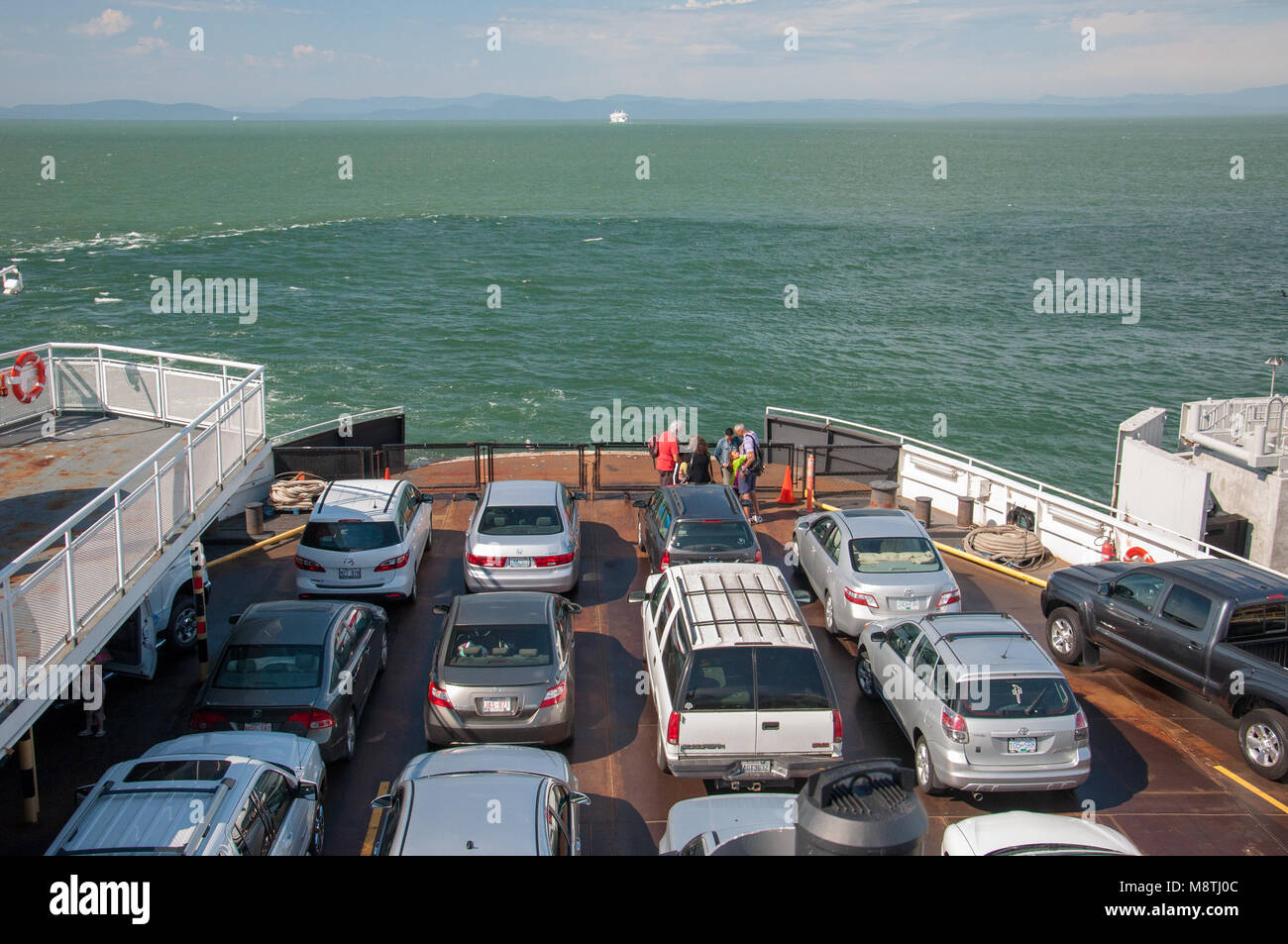 Passenger vehicles on board a BC Ferries vessel on its way to Vancouver ...