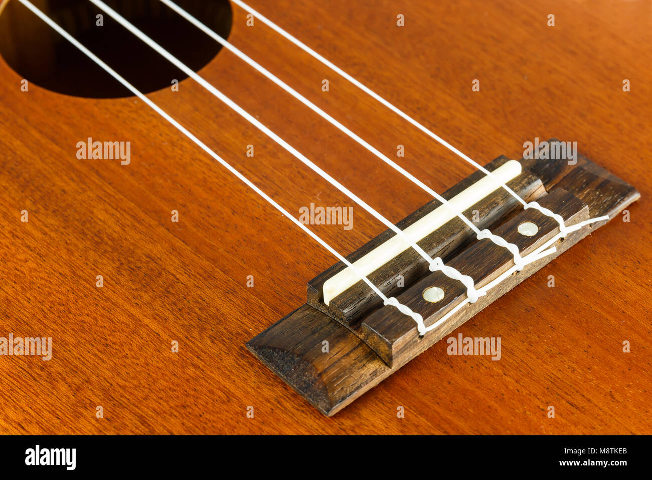 Body part of ukulele guitar Stock Photo - Alamy