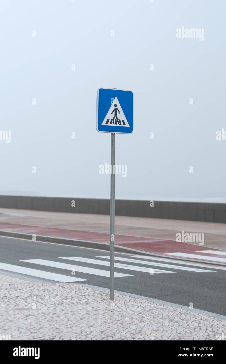road signs on a promenade at the atlantic shore in Portugal Stock Photo ...