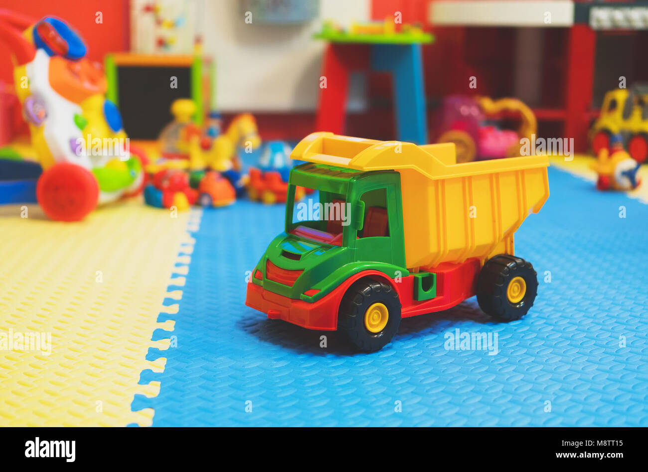 Empty children's playroom with different toys Stock Photo - Alamy