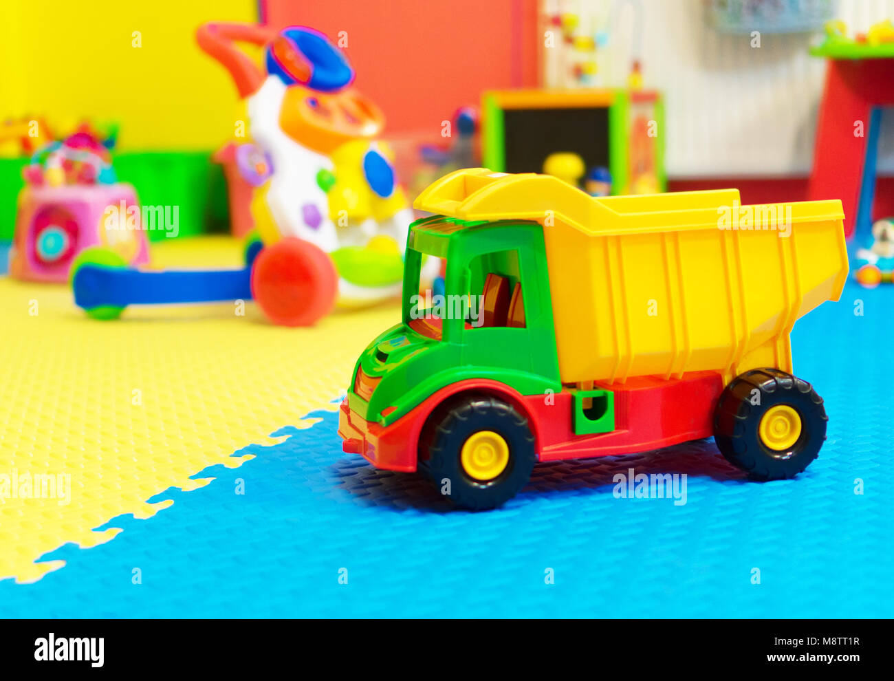 Empty children's playroom with different toys Stock Photo - Alamy