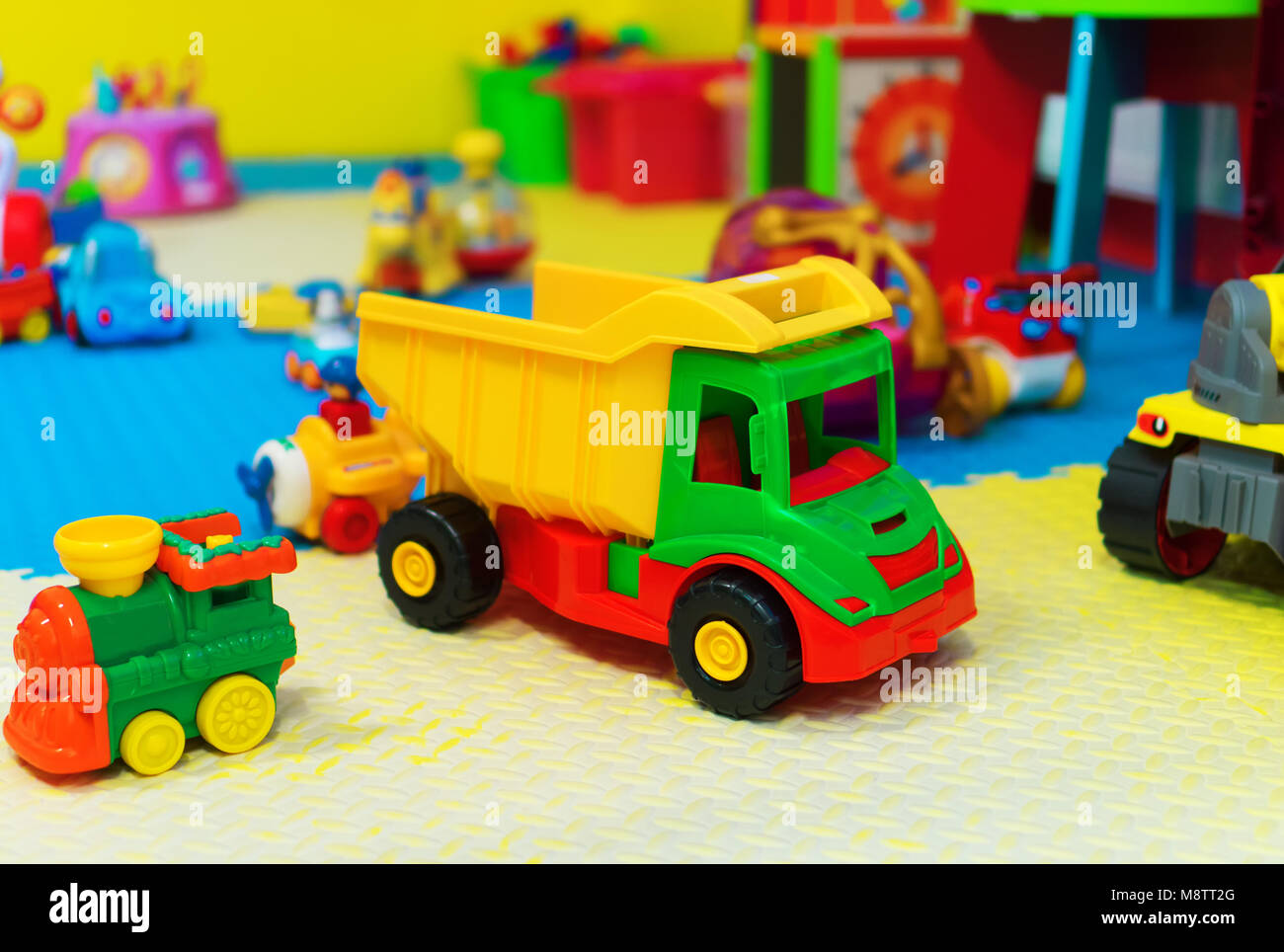 Empty children's playroom with different toys Stock Photo - Alamy