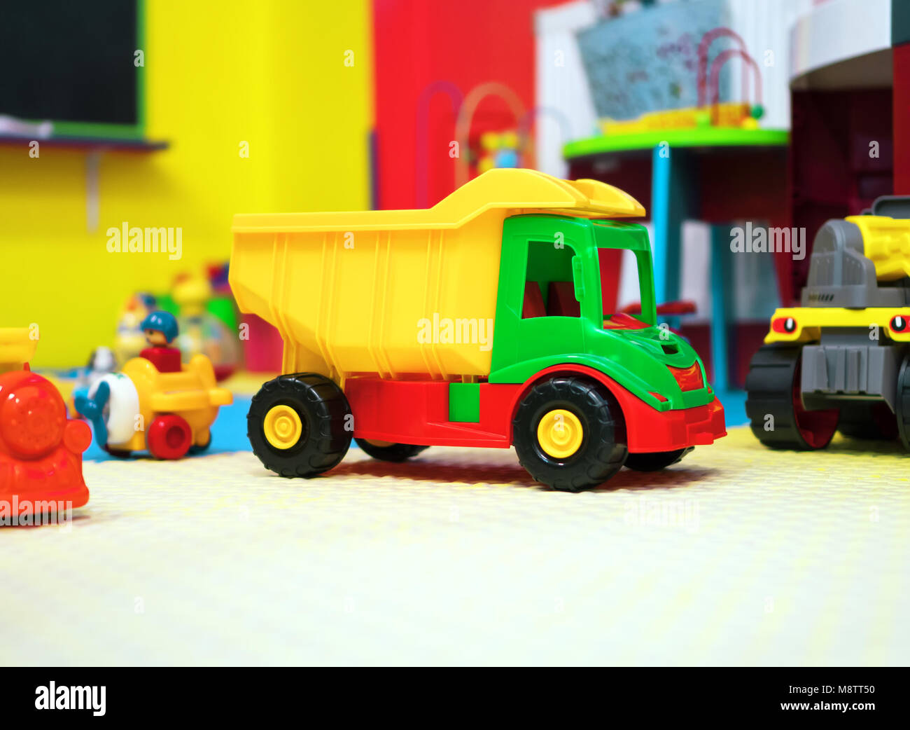 Empty children's playroom with different toys Stock Photo - Alamy