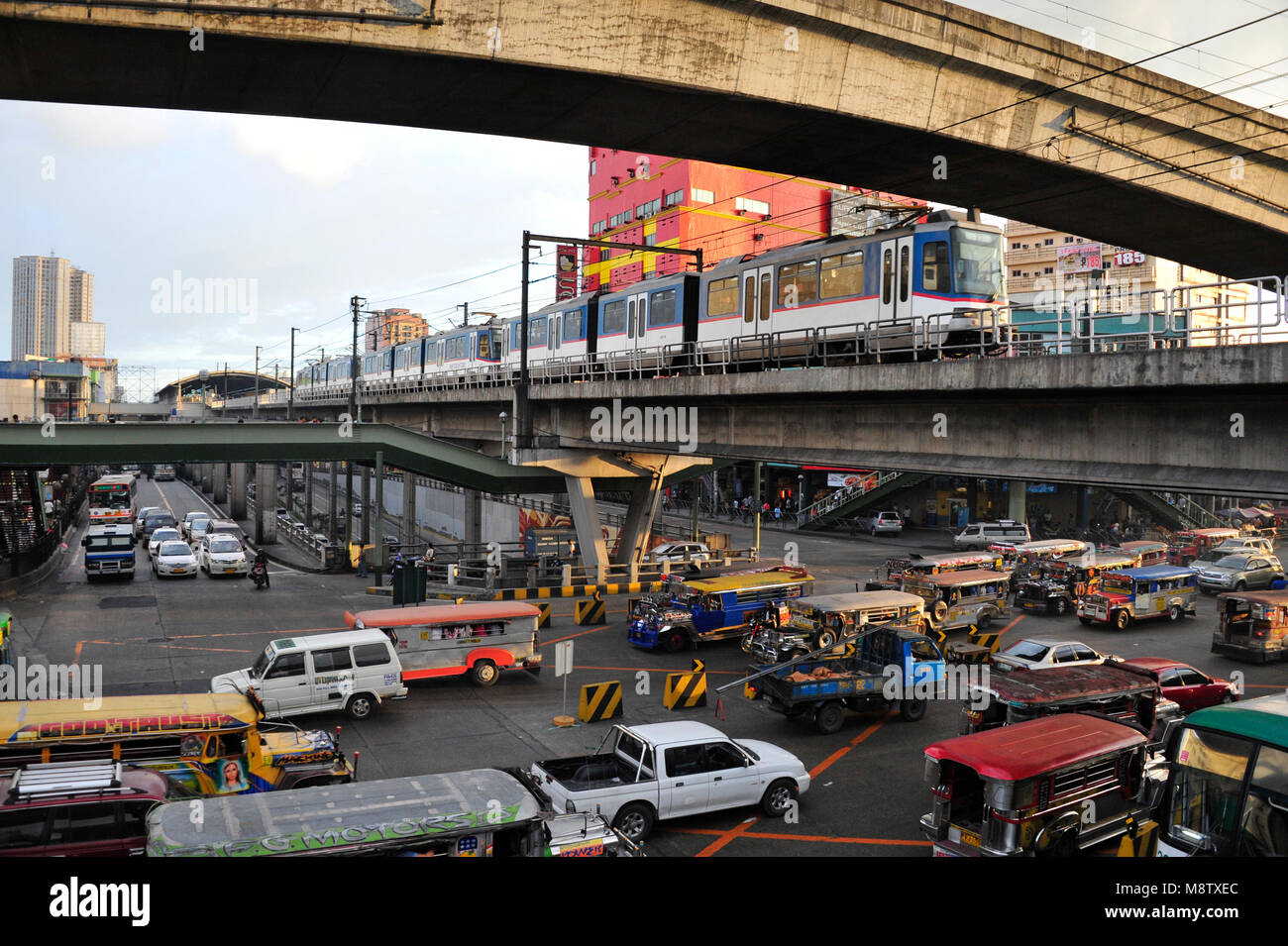 A metro train departs from a station in Metro Manila, Philippines Stock ...