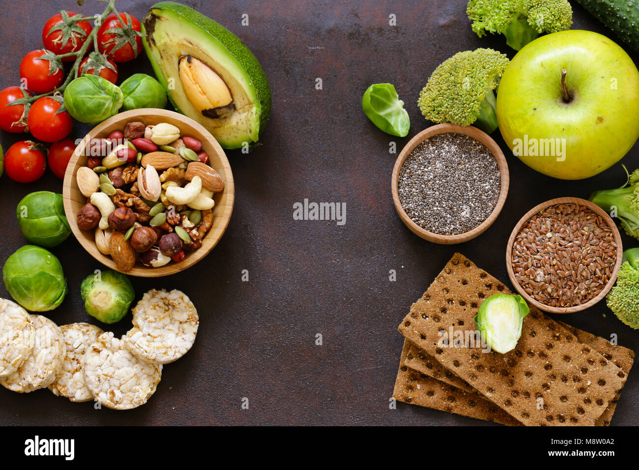 vegetarian food products - nuts, seeds, vegetables Stock Photo - Alamy