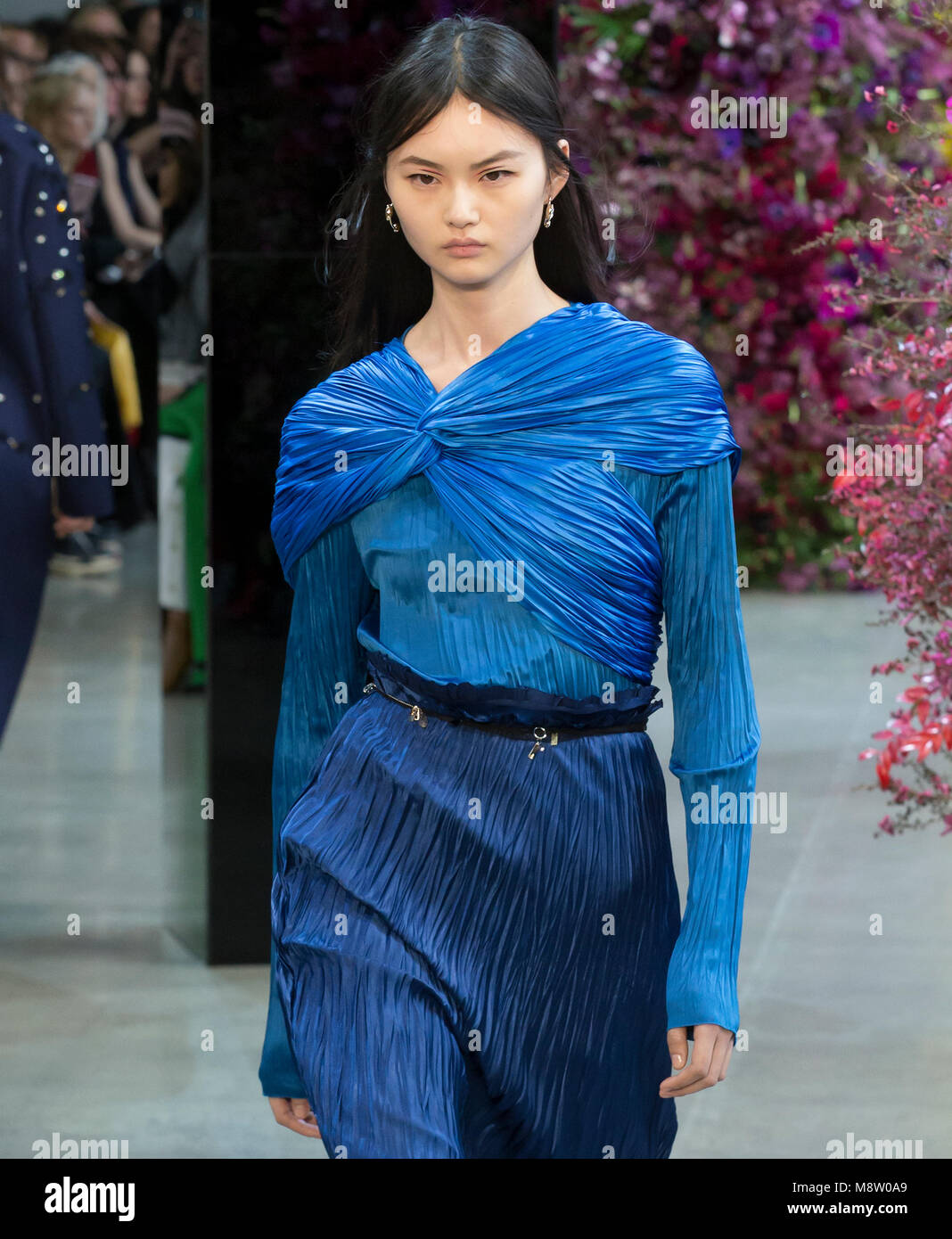 NEW YORK, NY - February 09, 2018: He Cong walks the runway at the Jason ...