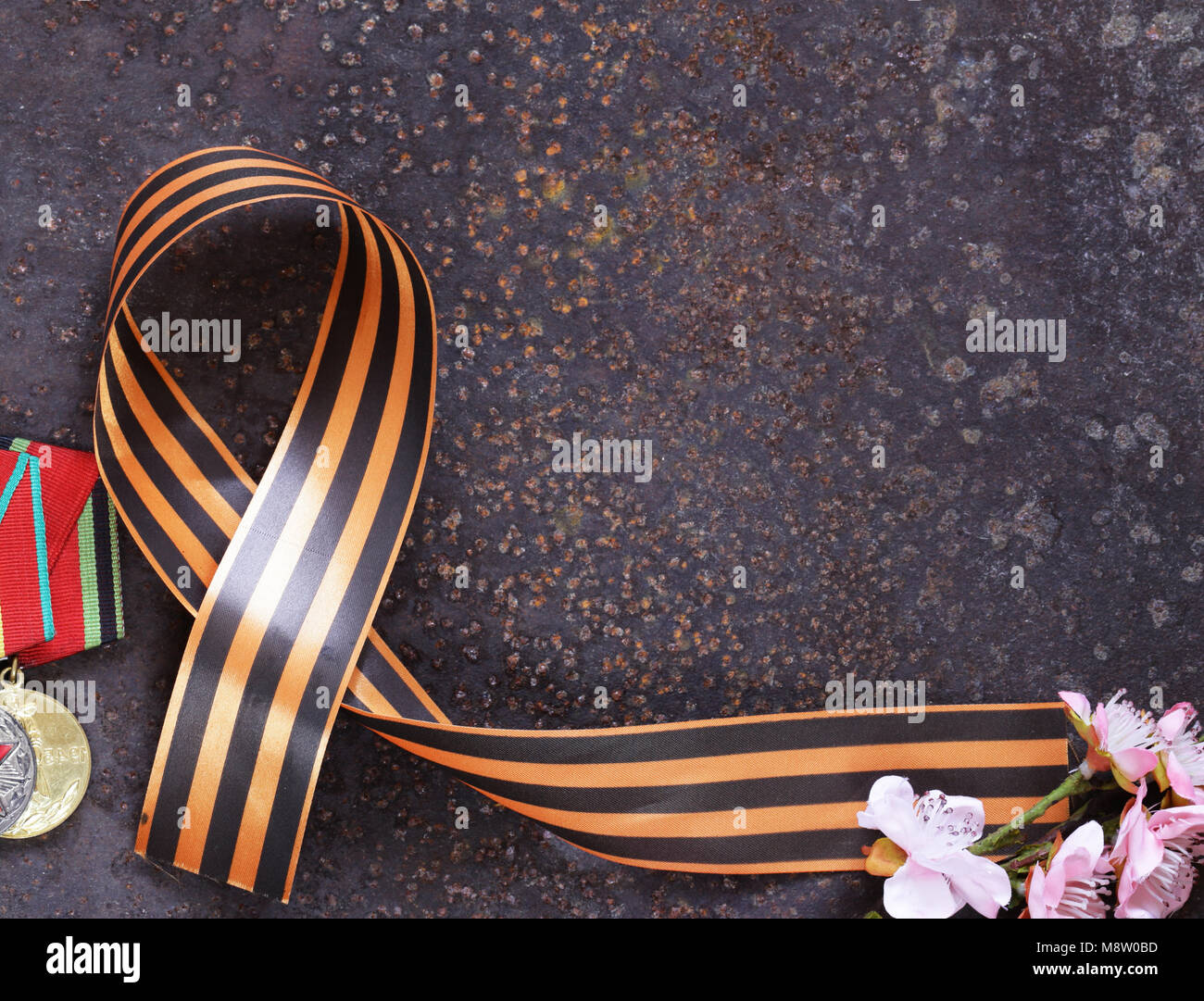 symbol Victory Day ribbon and medals on an iron background Stock Photo ...
