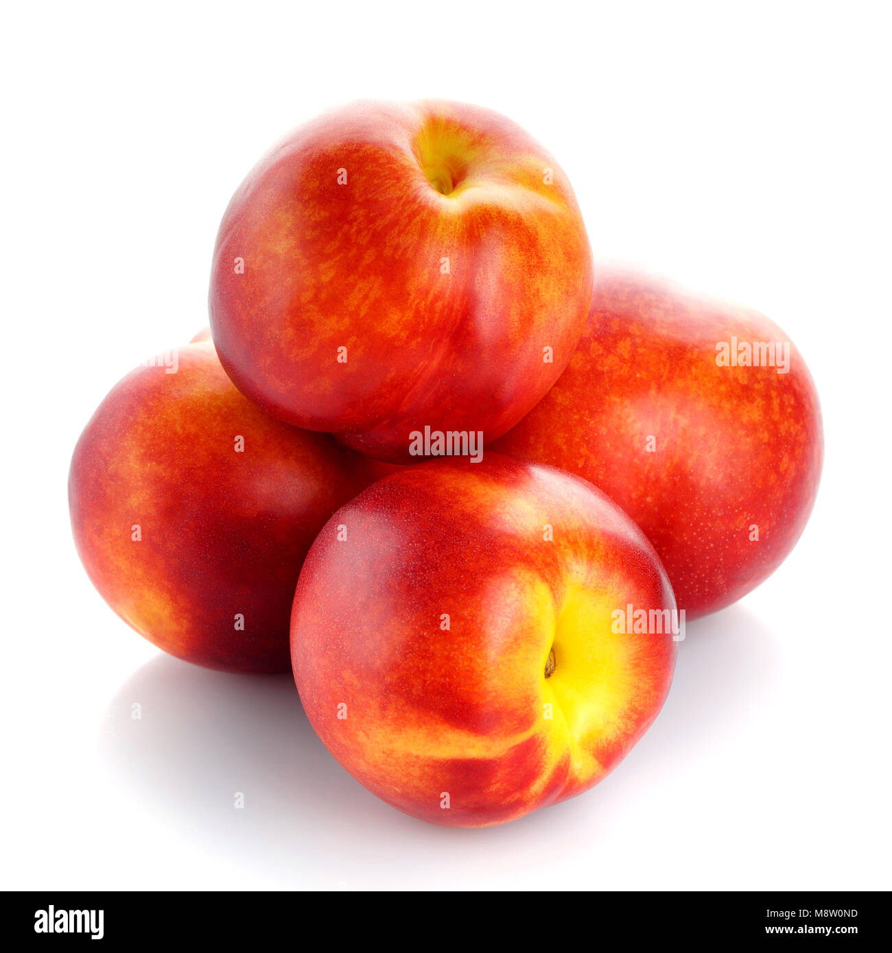 Red peaches isolated on a white background Stock Photo - Alamy