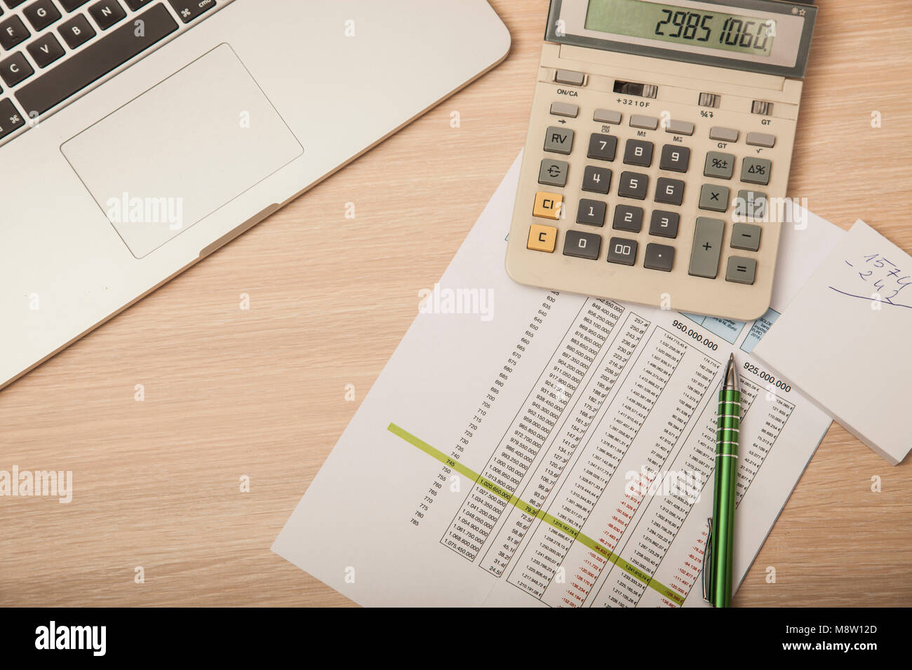 view of the office desk, calculations and notes on the paper Stock ...