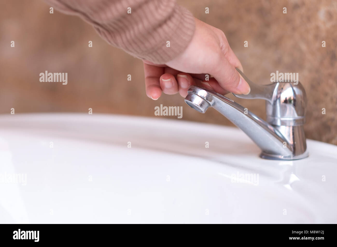 Close up hand open or close water tab . faucet and saving concept Stock ... Close up hand open or close water tab . faucet and saving concept Stock ...