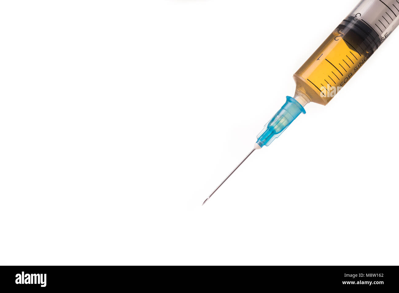 syringe with brown liquid isolated on white background Stock Photo - Alamy