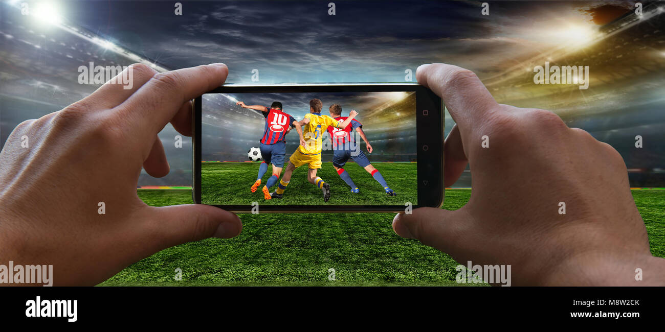 Football fan on phone in stadium hi-res stock photography and images ...