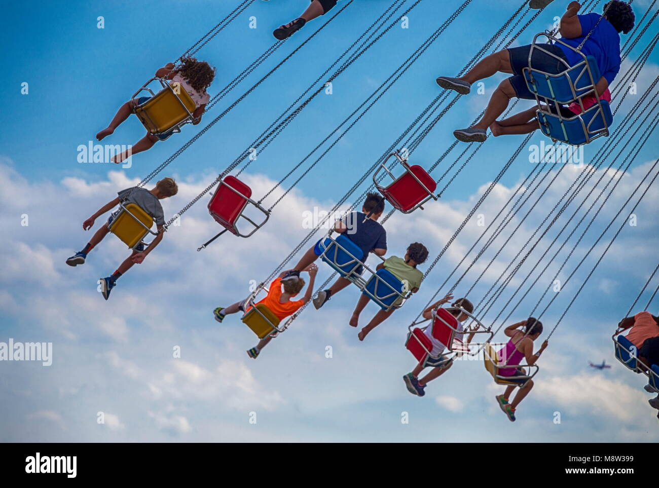 CHICAGO, IL, July 02, 2017: Children ride the wave swinger, at Navy ...