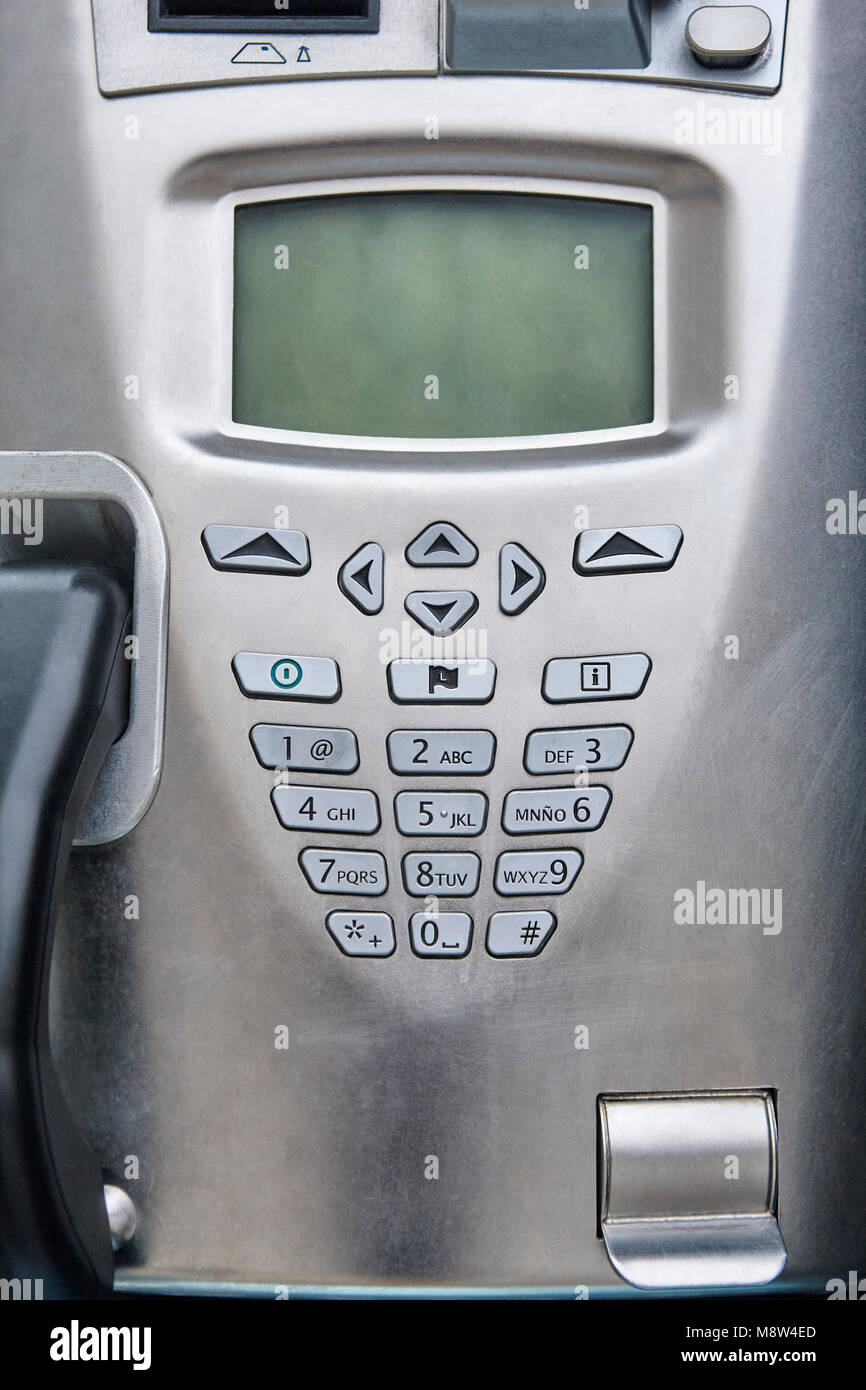 Public telephone detail. Traditional street payphone. Urban cabin ...