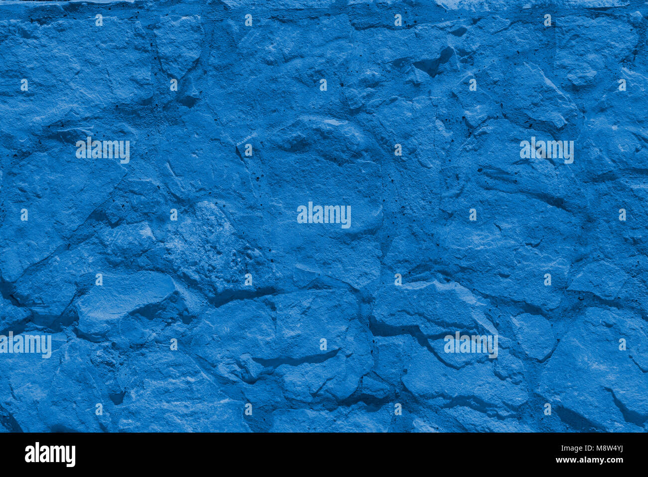 Horizontal stone wall of a nature rock - close up. Toning in pantone ...