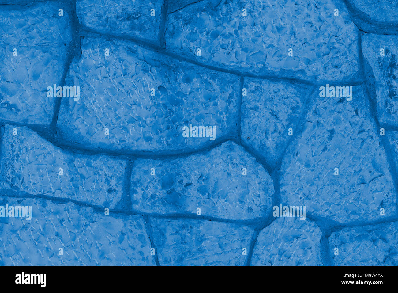 Horizontal stone wall of a nature rock - close up. Toning in pantone ...