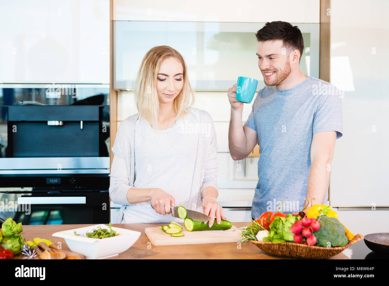 couple preparing food Stock Photo - Alamy