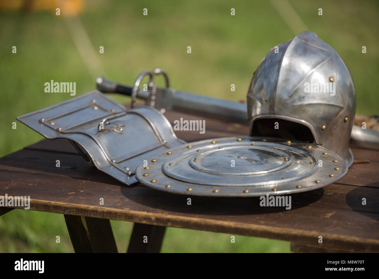 Helmets, Shields and Medieval Metallic Armors and Weapons, Outdoors on ...