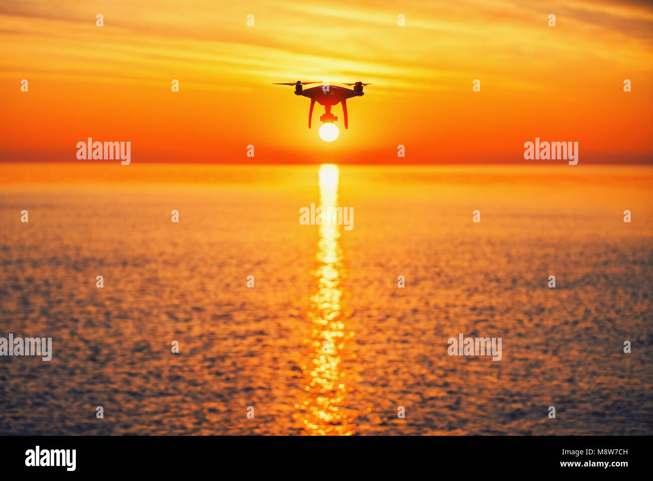 Flying drone over water hi-res stock photography and images - Alamy
