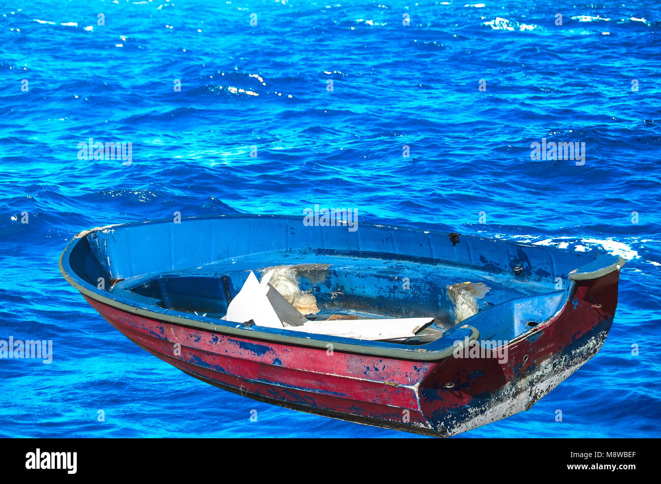 empty boat on the ocean Stock Photo - Alamy