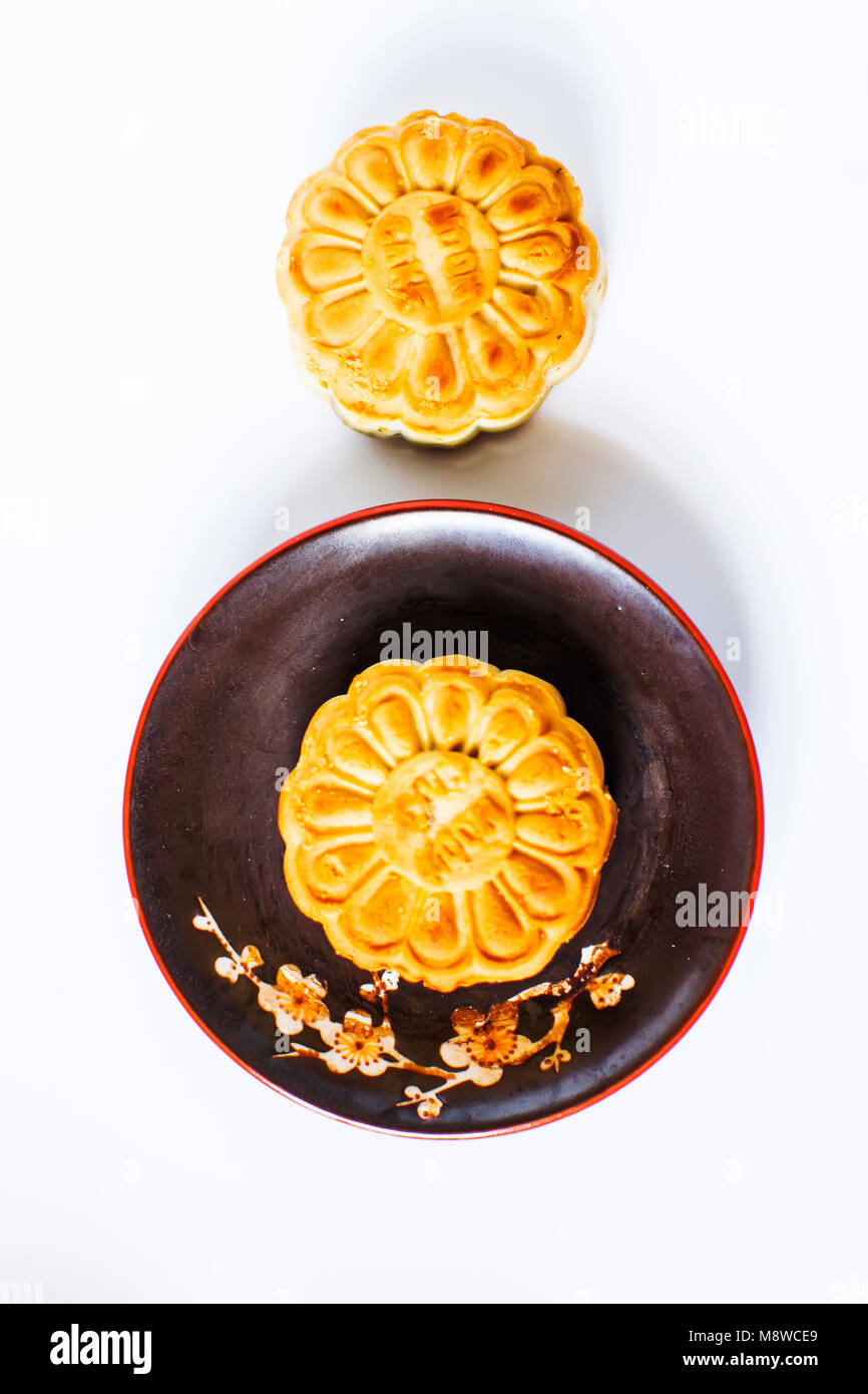 Moon cake for Chinese mid autumn festival. Isolated on white. Copy ...