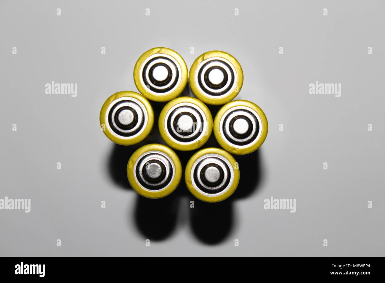 Top Positive Side of Batteries Hexagonal Stock Photo - Alamy