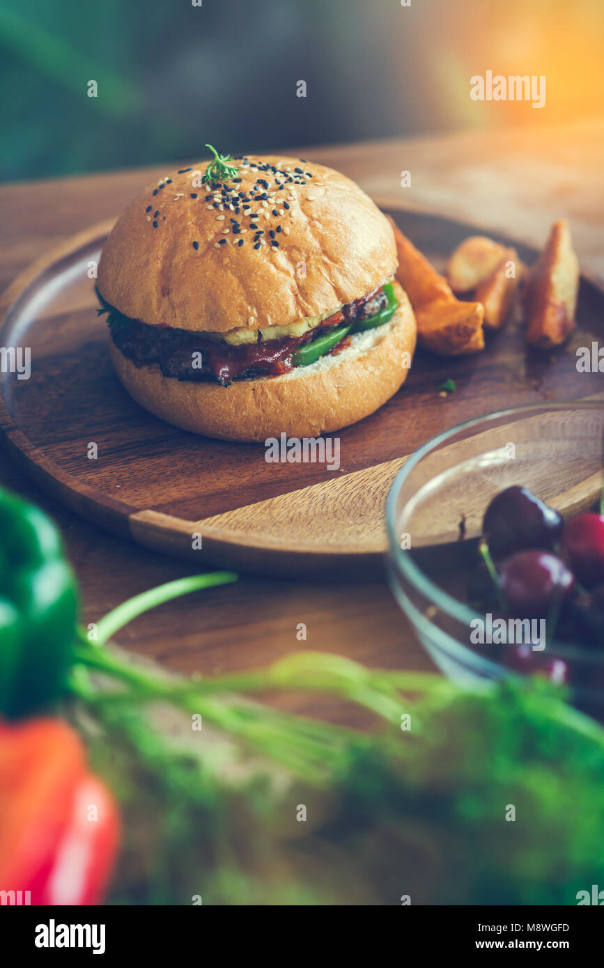 Burger on the plate hi-res stock photography and images - Alamy