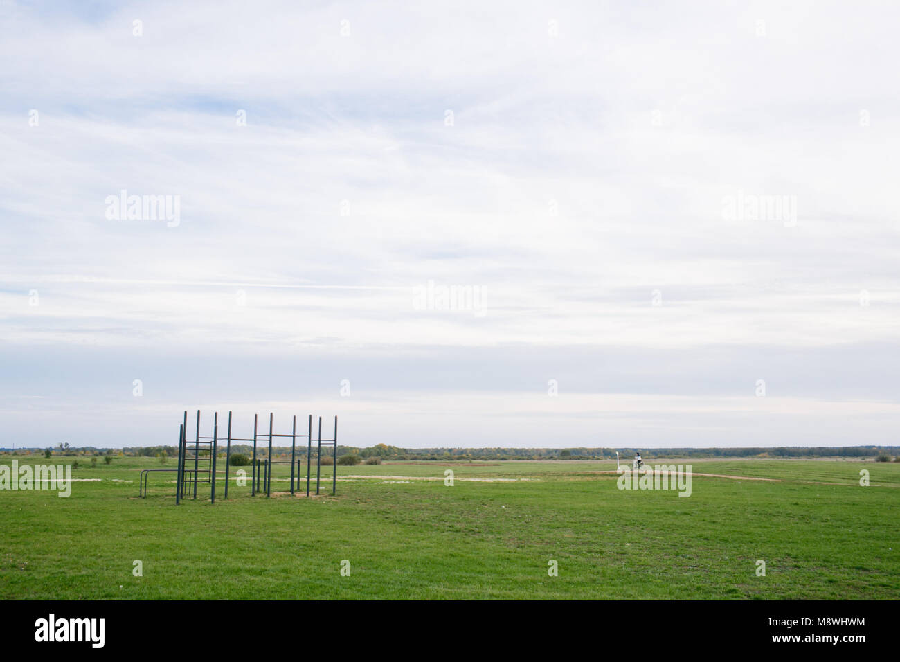 Public training ground in a park. street workout and horizontal bar on ...