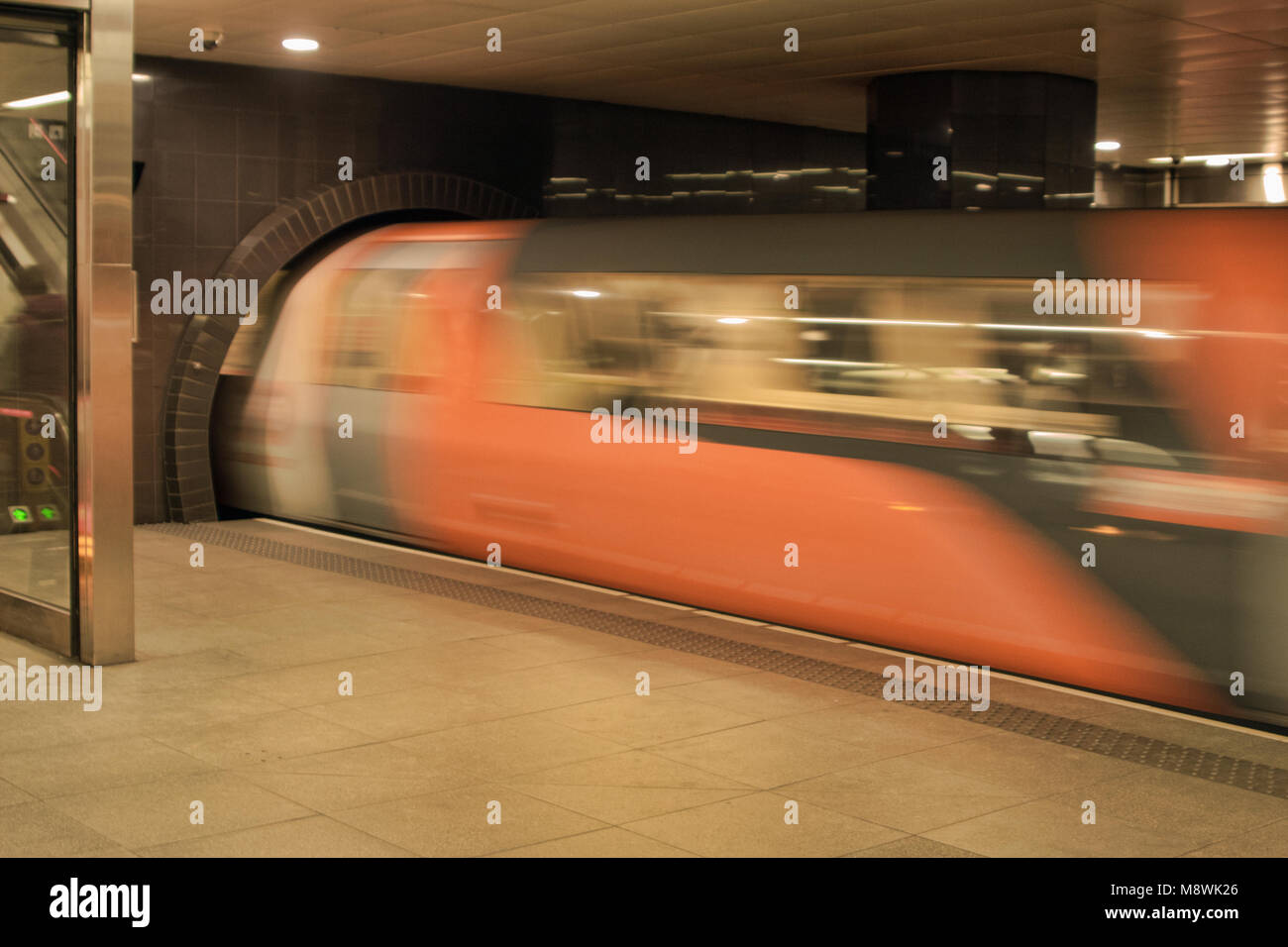 Train travelling through Partick Subway station, Glasgow, Scotland ...