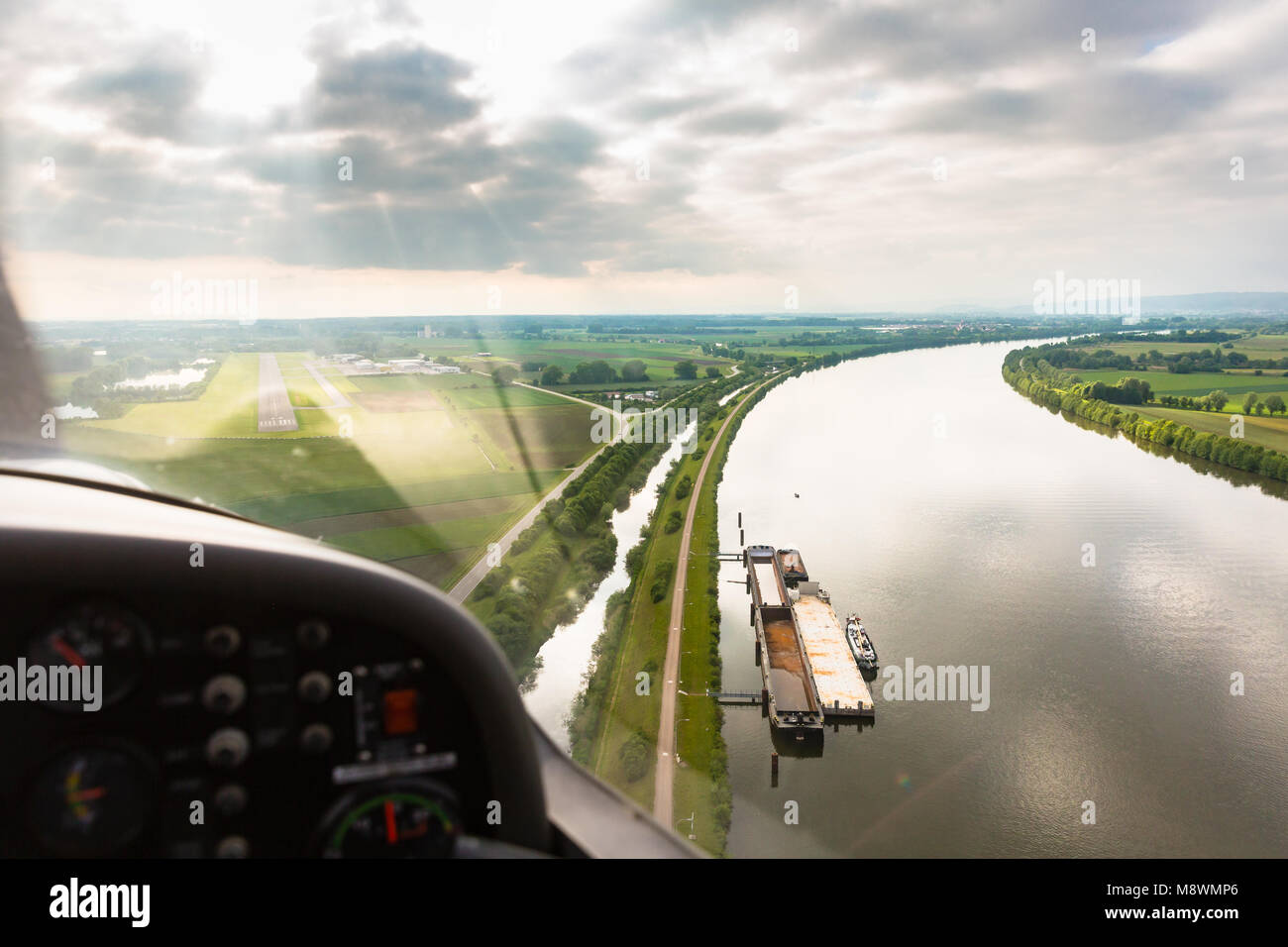 View from a flying sport plane over river landscape Stock Photo - Alamy
