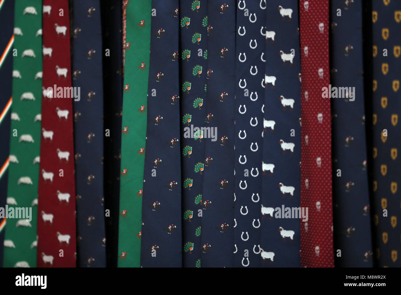 A collection of ties in a shopping stall at Cheltenham Racecourse Stock ...