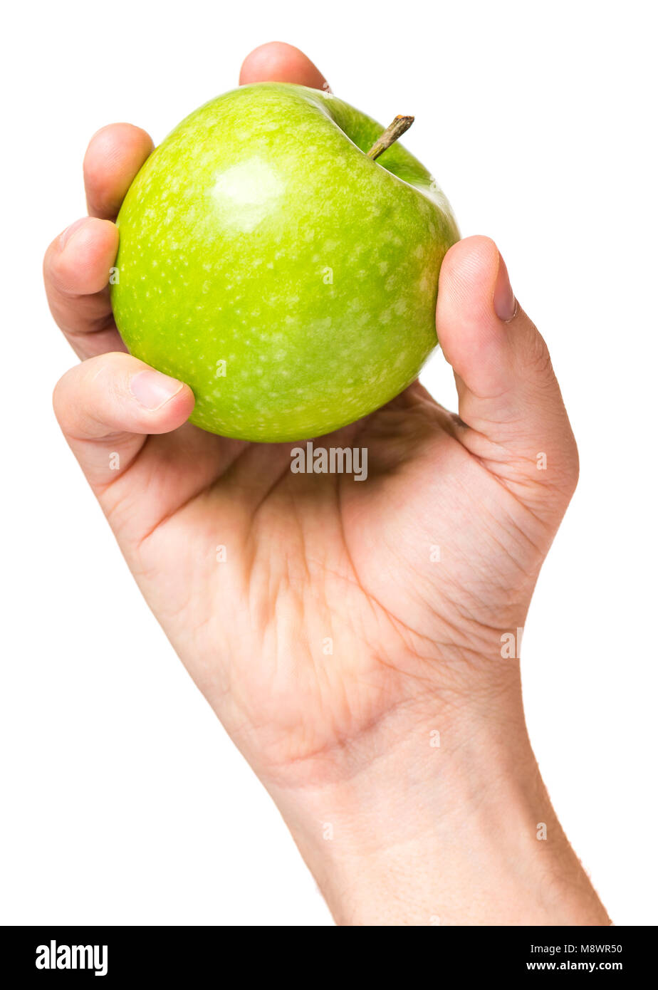Male hand holding green apple, isolated on white background Stock Photo ...