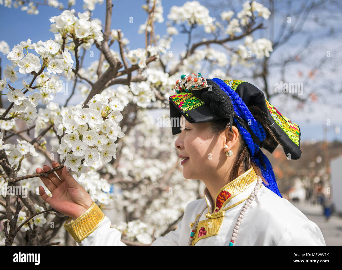 Jinchuan, China's Sichuan Province. 20th Mar, 2018. A tourist enjoys ...