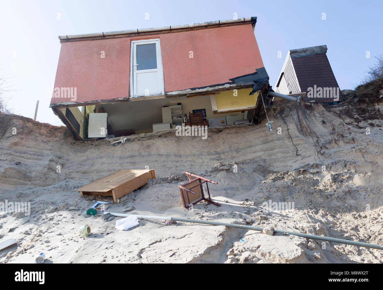 English house falling into sea hi-res stock photography and images - Alamy