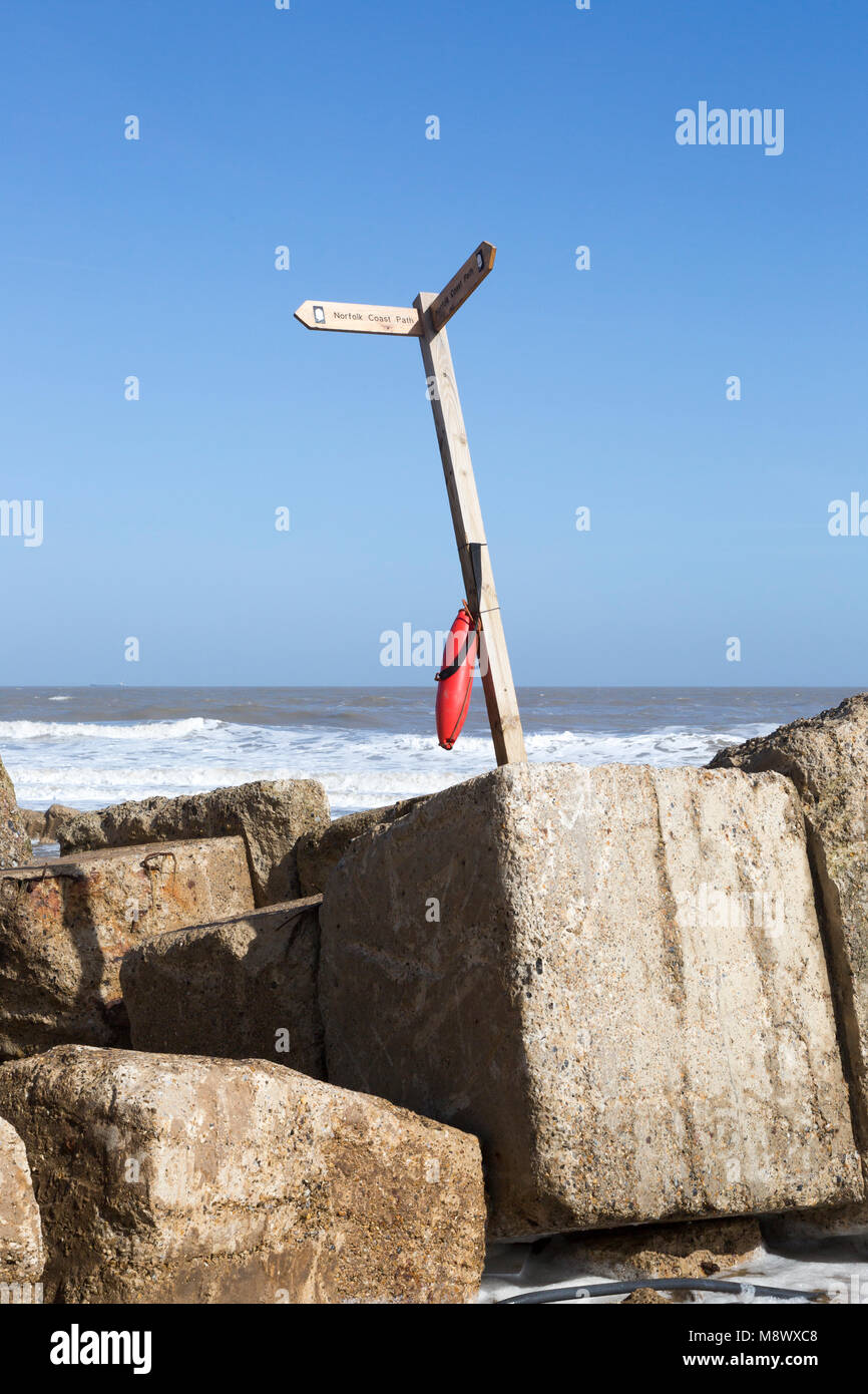 March 20 2018 Hemsby, UK. Coast path sign left abandoned by coastal ...