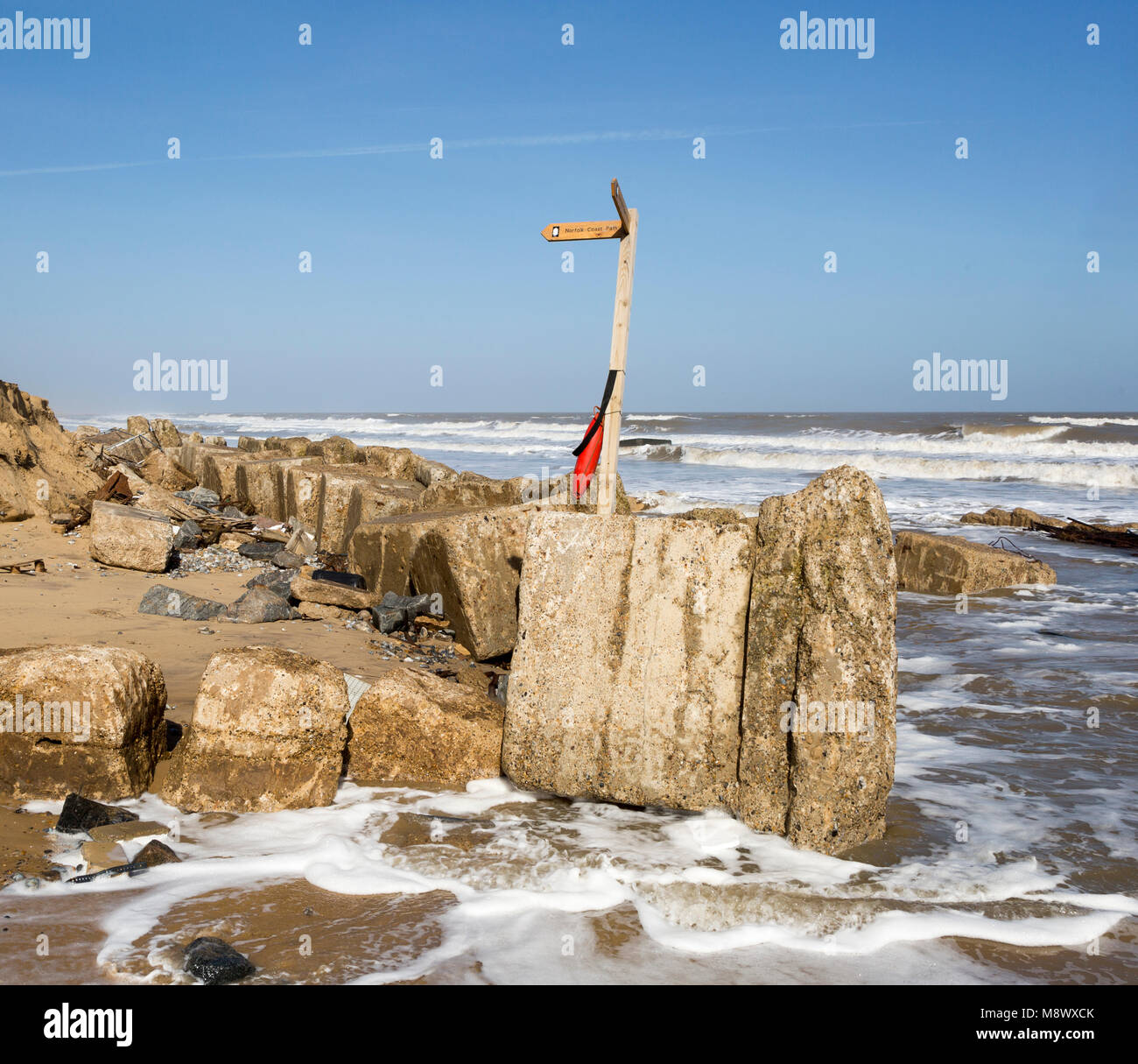 March 20 2018 Hemsby, UK. Coast path sign left abandoned by coastal ...