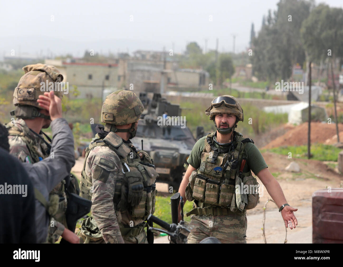 Afrin. 20th Mar, 2018. Turkish soldiers stand guard at a security ...