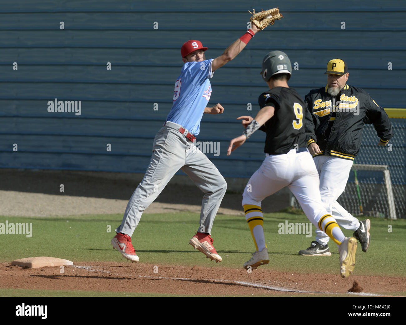 U.S. 20th Mar, 2018. SPORTS -- Sandia's Ricky Apodaca stretches to ...