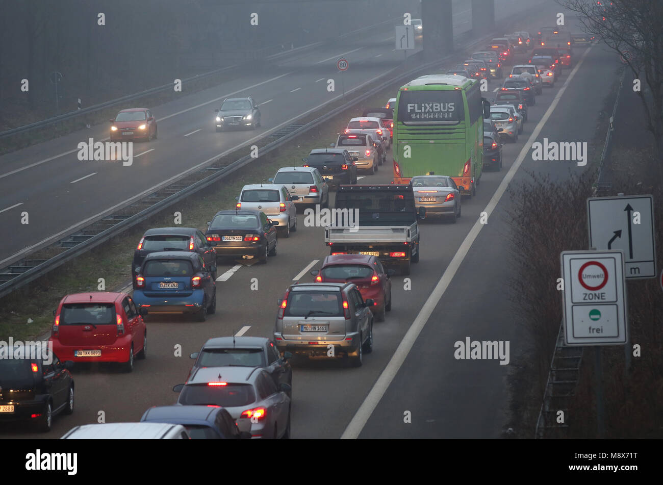 21 March 2018, Germany, Duesseldorf: A traffic jam in the early morning ...